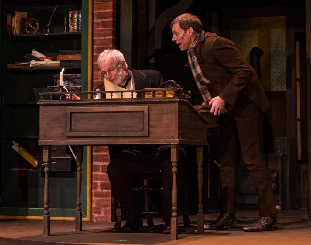 Scrooge and his clerk Bob Cratchit | Totem Pole Playhouse